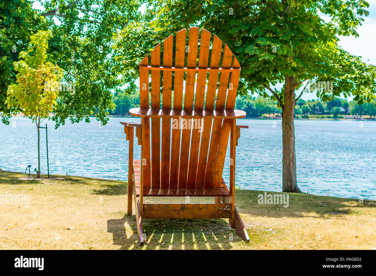 Large wooden chair in Quebec, Canada Stock Photo - Alamy