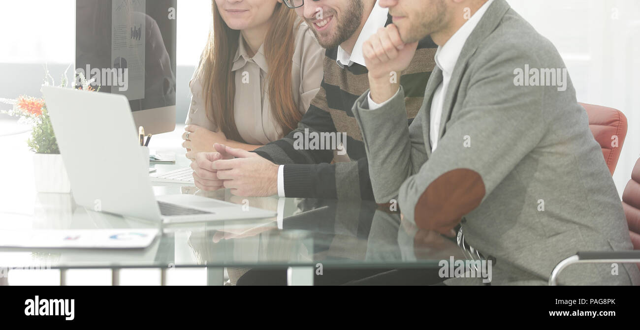 successful business team sitting at the Desk Stock Photo - Alamy