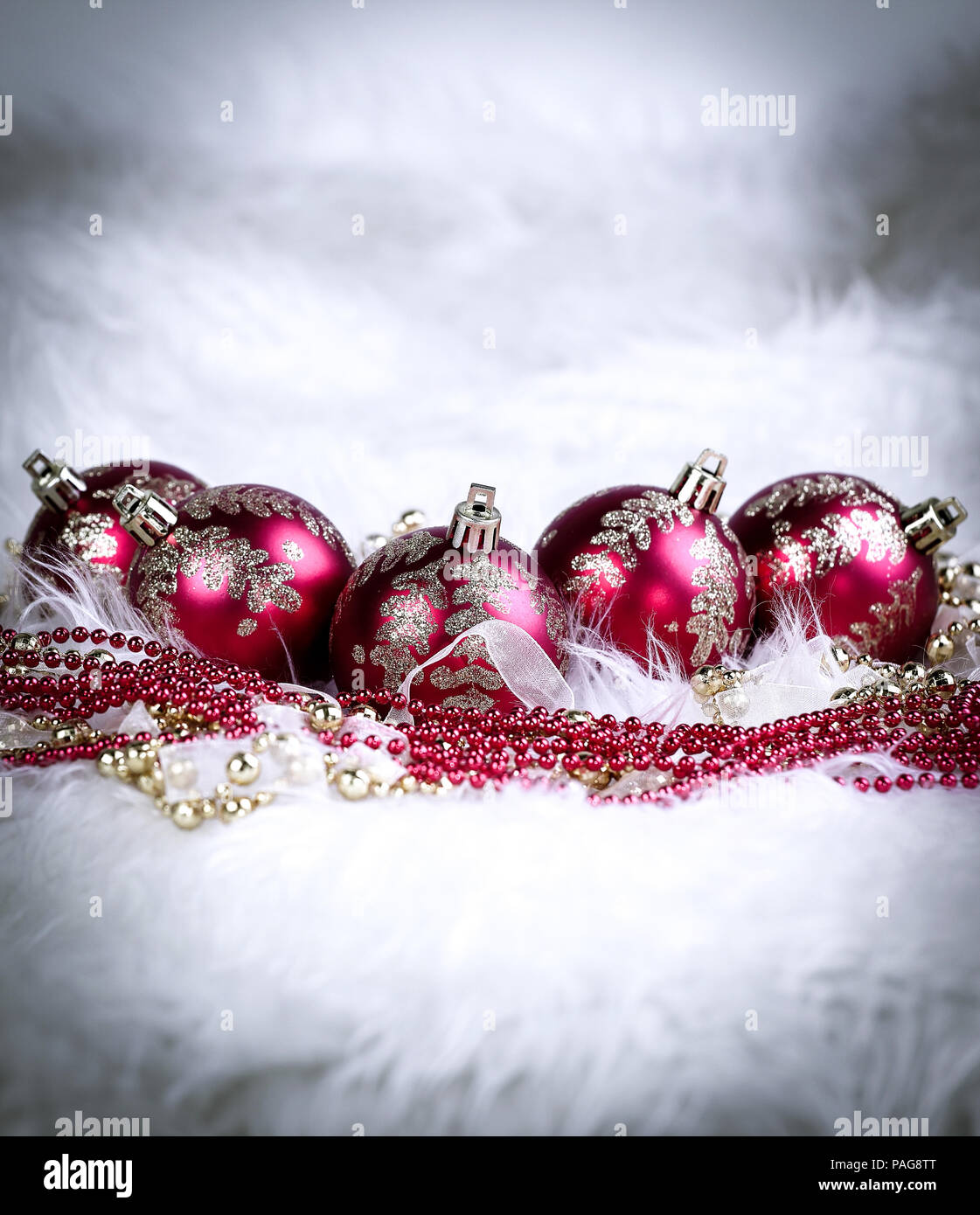 red Christmas balls on a festive white background Stock Photo - Alamy