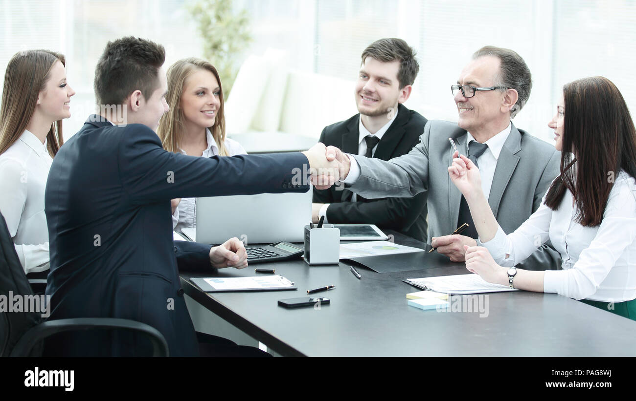 business partners shaking hands after a successful transaction Stock ...