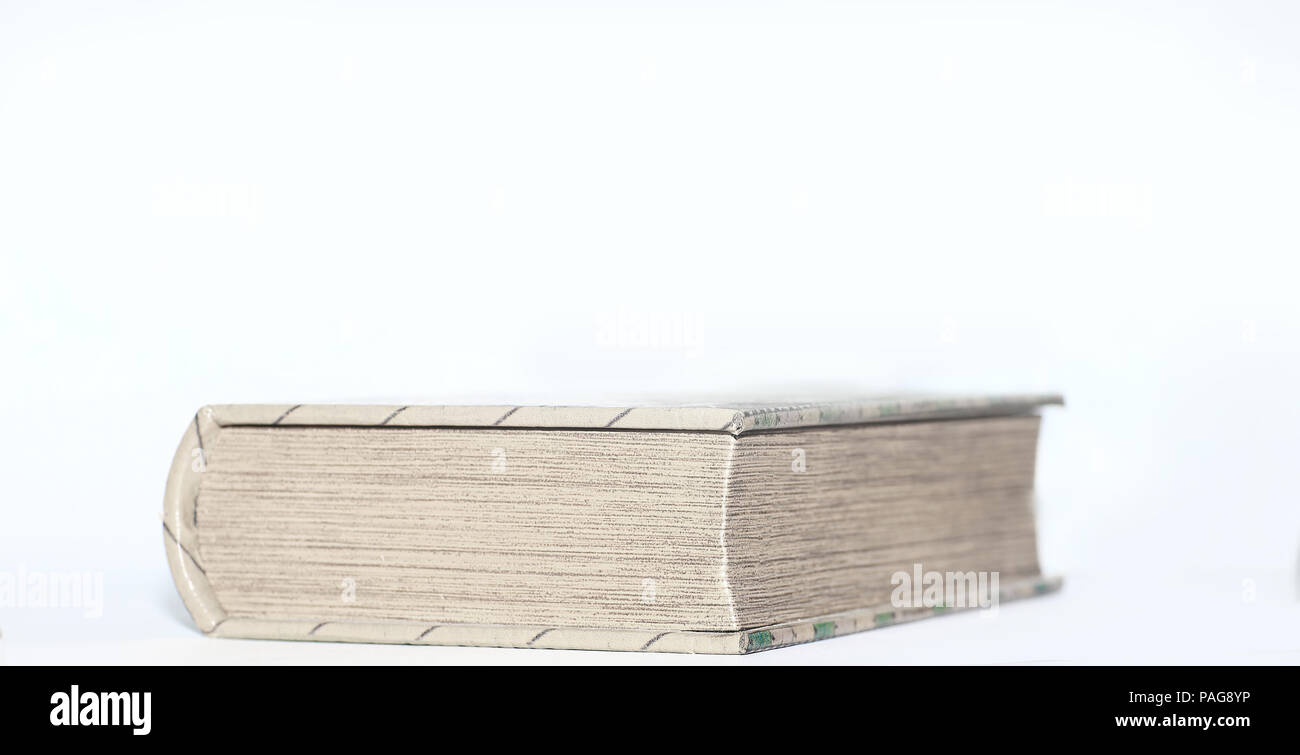 close up.thick closed book on white background Stock Photo - Alamy
