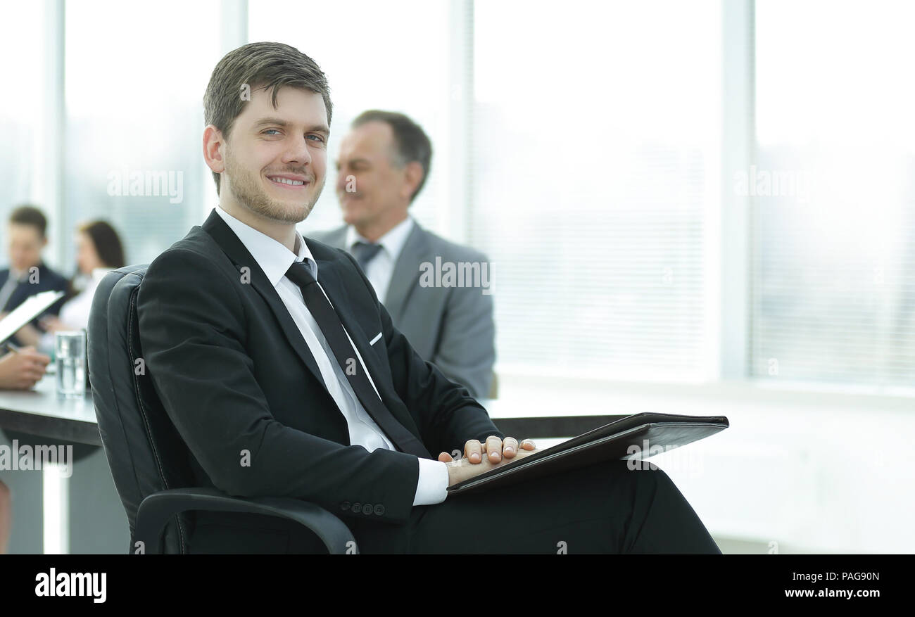 business man at office with his business team working behind Stock ...