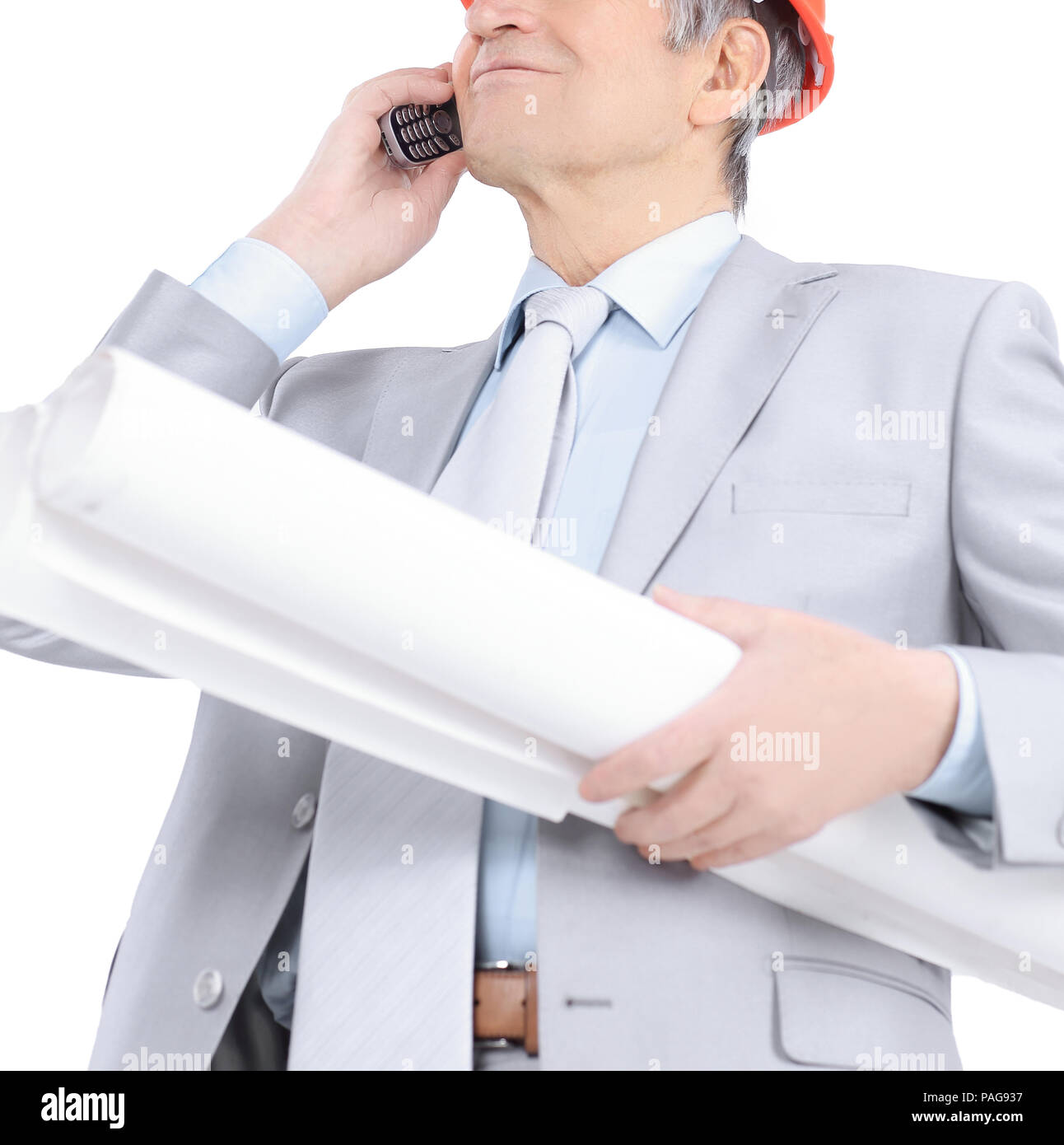 senior engineer with blueprints talking on cell phone Stock Photo - Alamy
