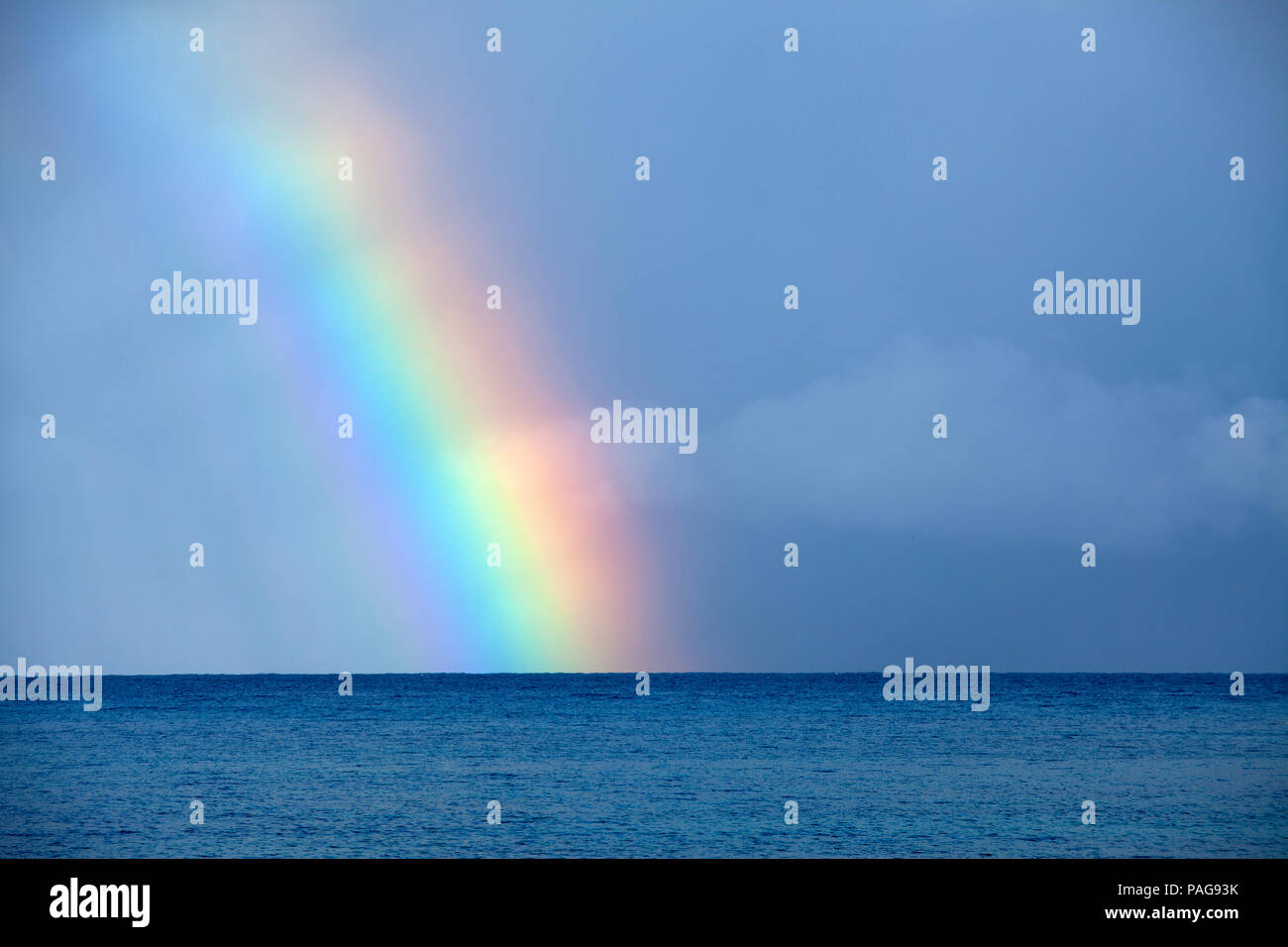 Rainbow over ocean at Maui, Hawaii Stock Photo - Alamy