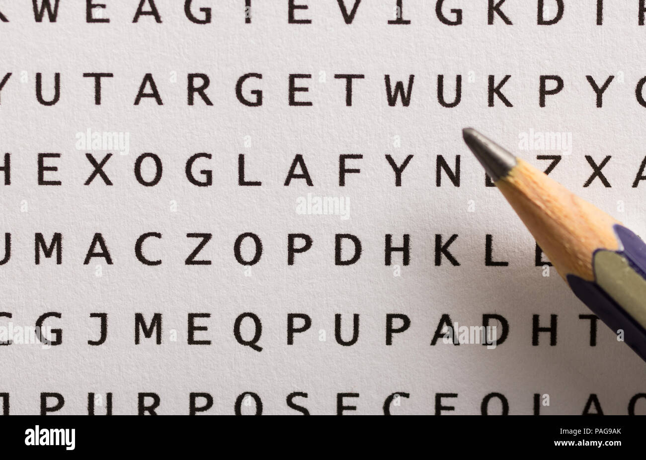 Word search, puzzle. Close up of letters on canvas. Concept about ...