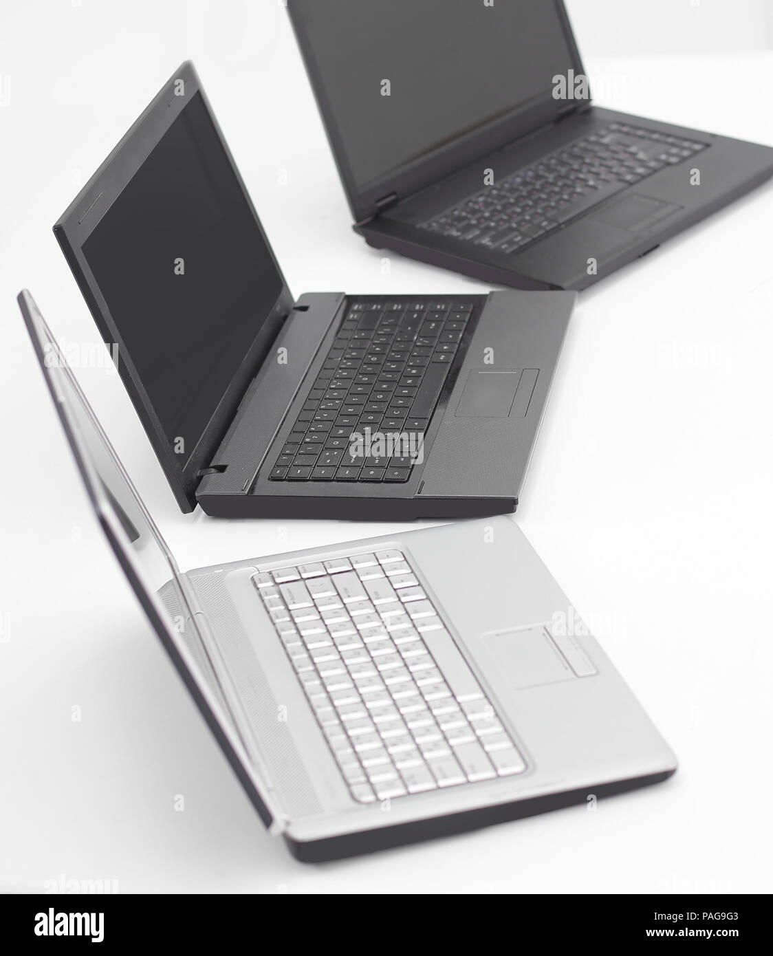 open laptop on the desktop in an empty office Stock Photo - Alamy