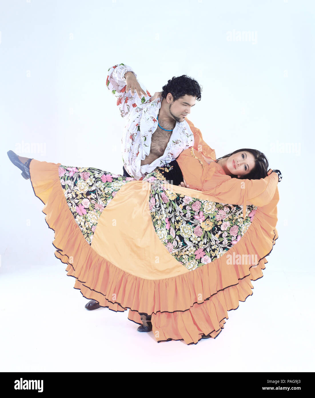 professional dance couple in a Gypsy costume perform folk dance Stock ...