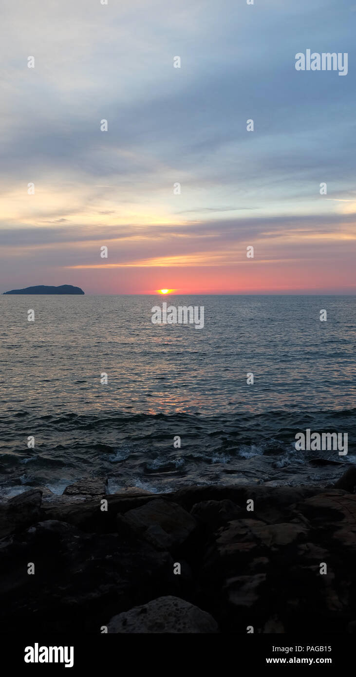 Ocean sunset beach horizon sky orange water hi-res stock photography ...