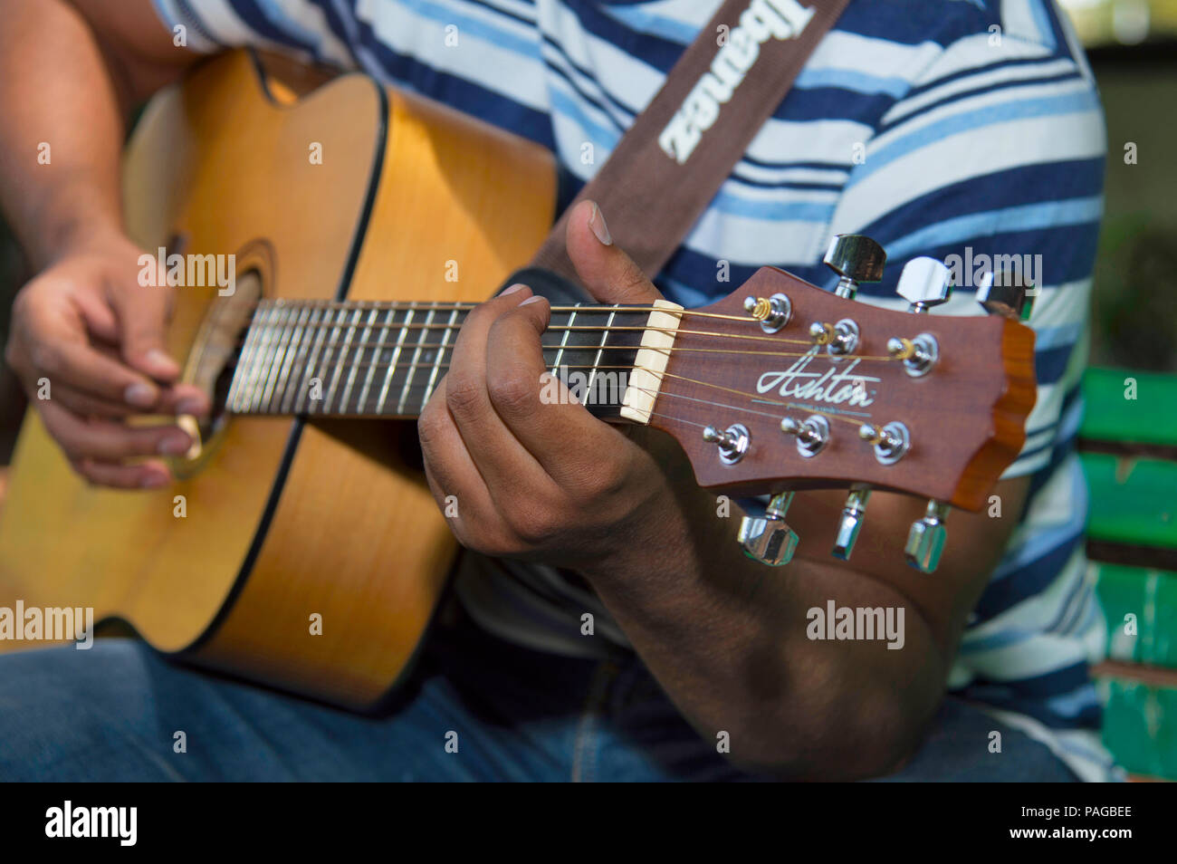 Smiling man play guitar happy hi-res stock photography and images - Alamy