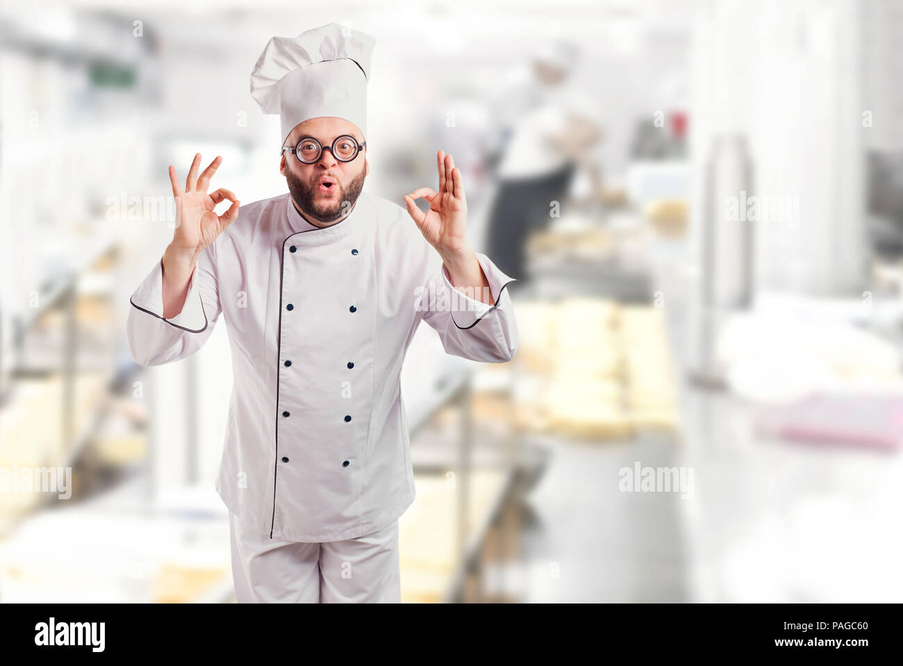 Funny cheerful chef in white uniform on background for text Stock Photo ...