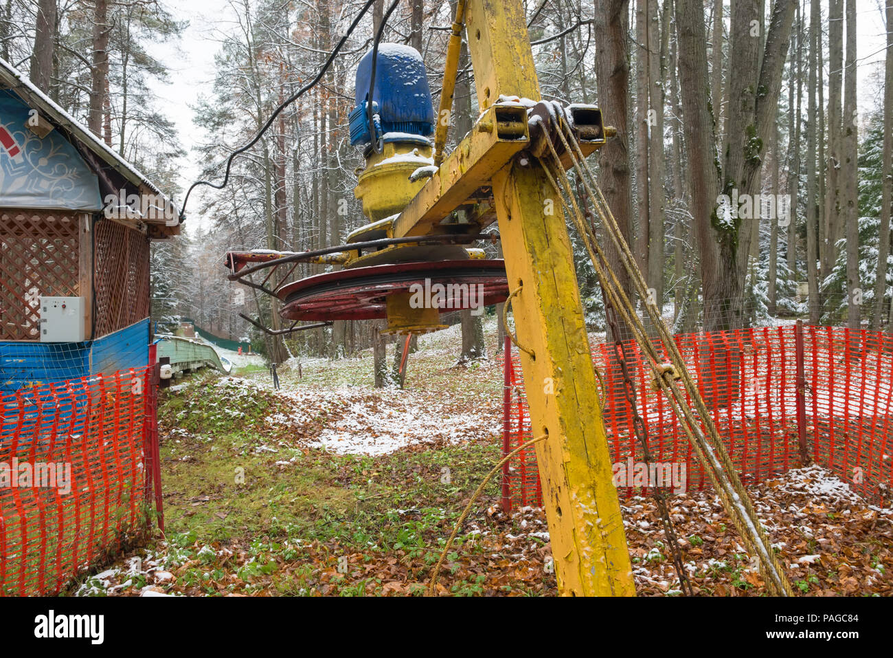 Giant pulley wheel at ski lift station with in late autumn. Chairlift ...