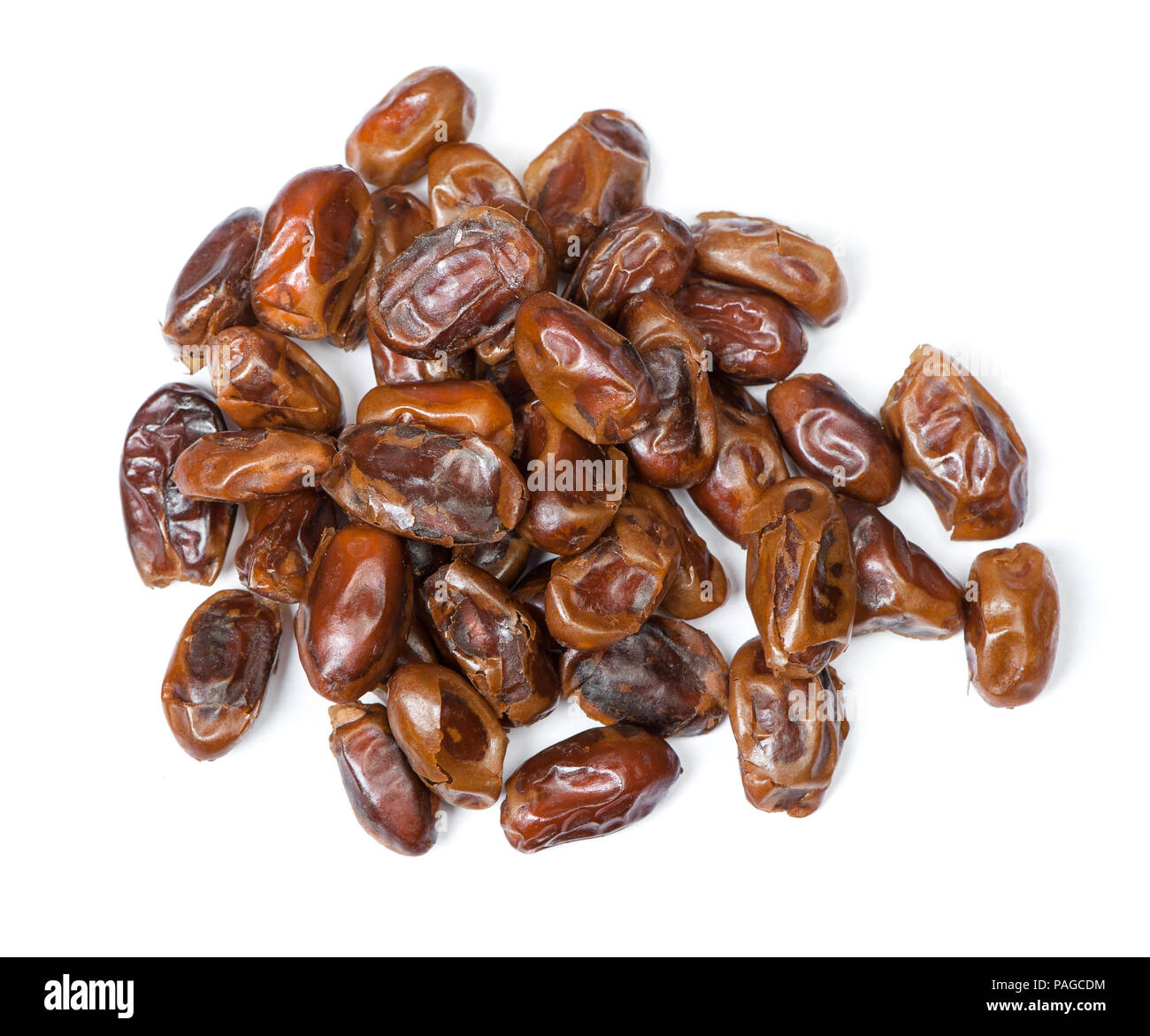 Heap of dried pitted dates isolated on white background Stock Photo - Alamy