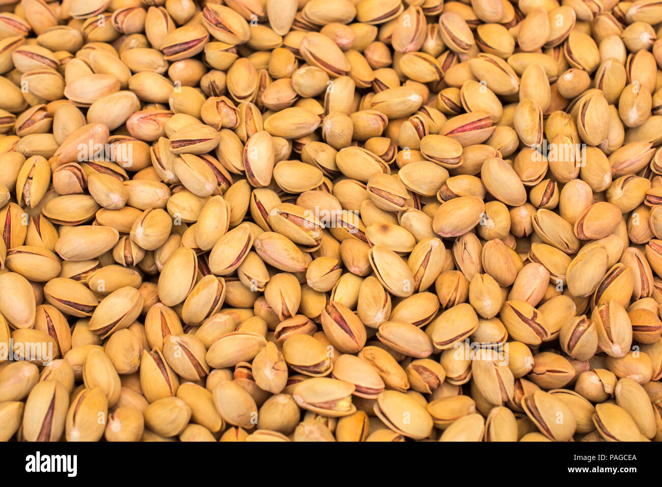 Pistachio nuts with shell ready to eat Stock Photo - Alamy