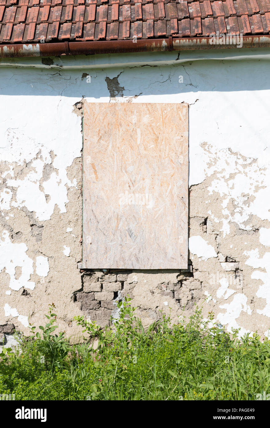 Broken window of an abandoned house in Romania Stock Photo - Alamy
