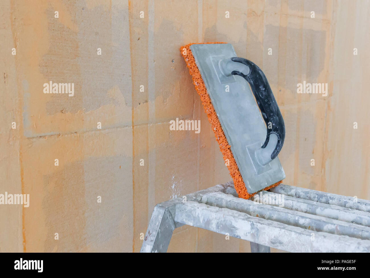 Worker tools - Small steps and a sponge used for plastering Stock Photo ...
