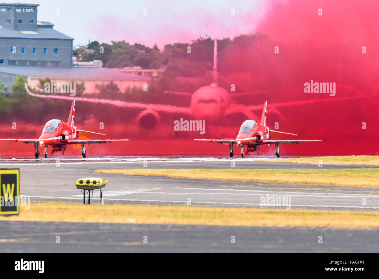 Royal Air Force RAF Red Arrows display team test their red smoke at the ...
