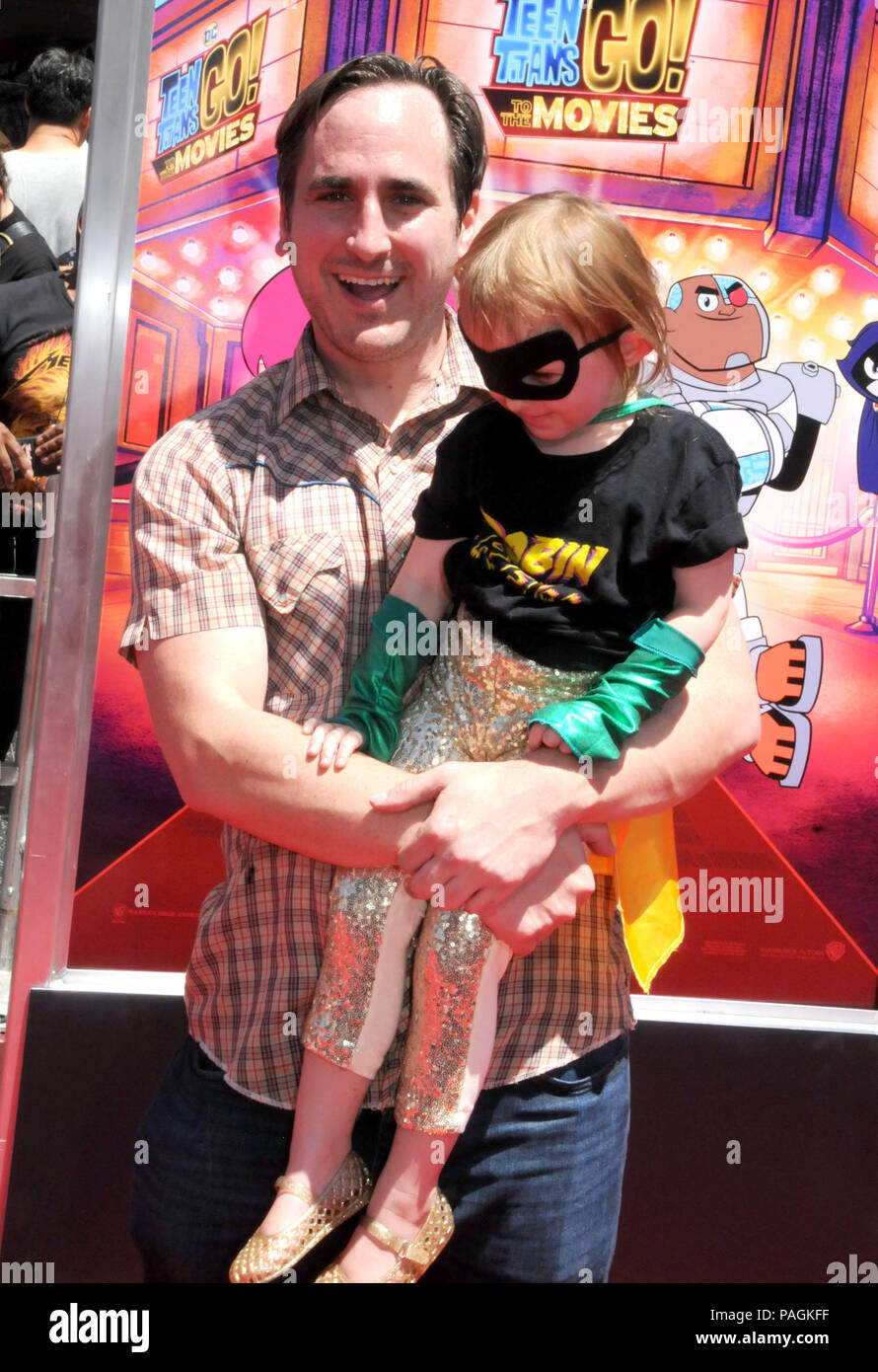 HOLLYWOOD, CA - JULY 22: Writer Michael Jelenic and guest attend Warner ...