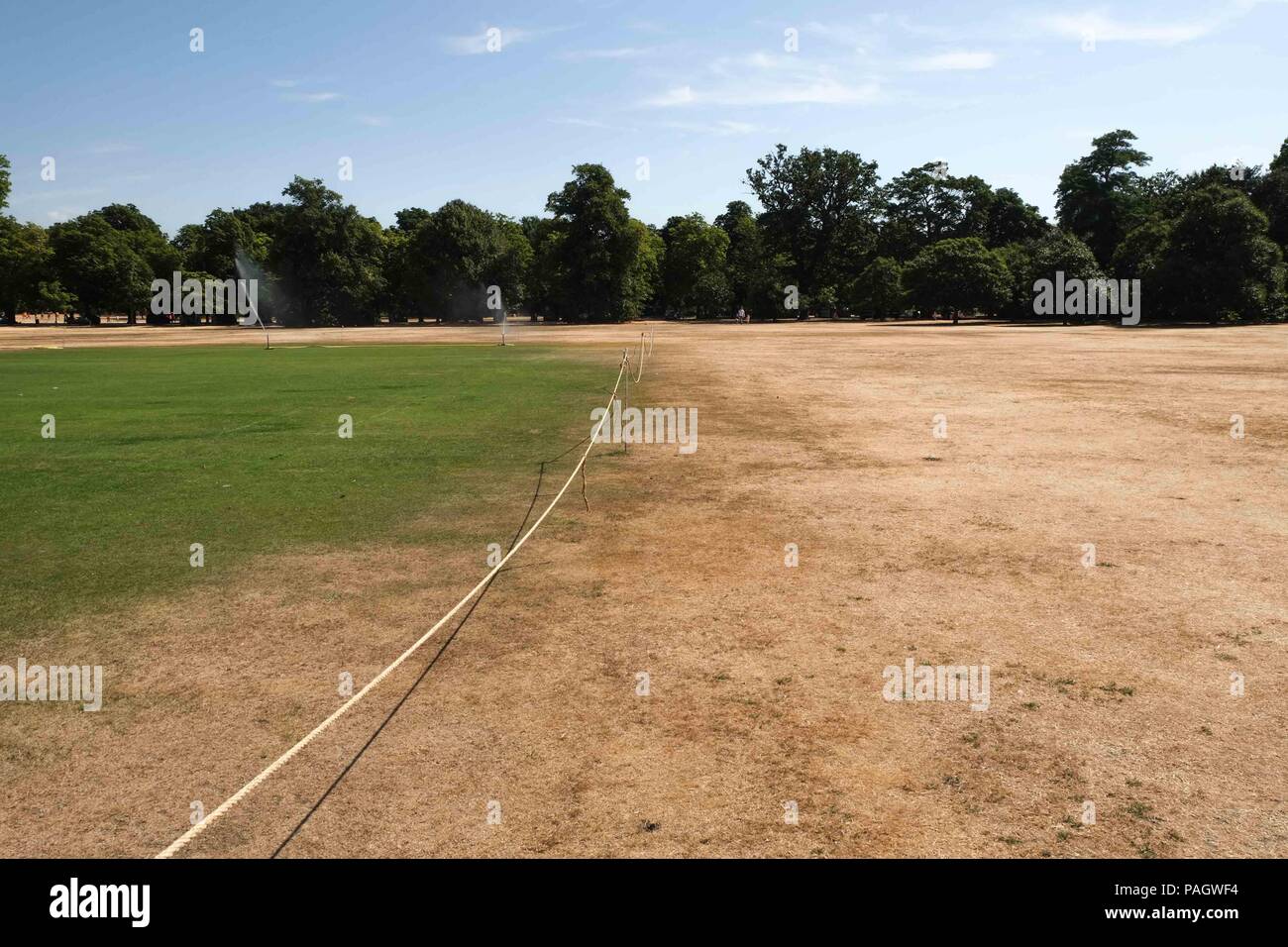 London 23rd July 2018: The cricket pitch in Greenwich Park is water ...