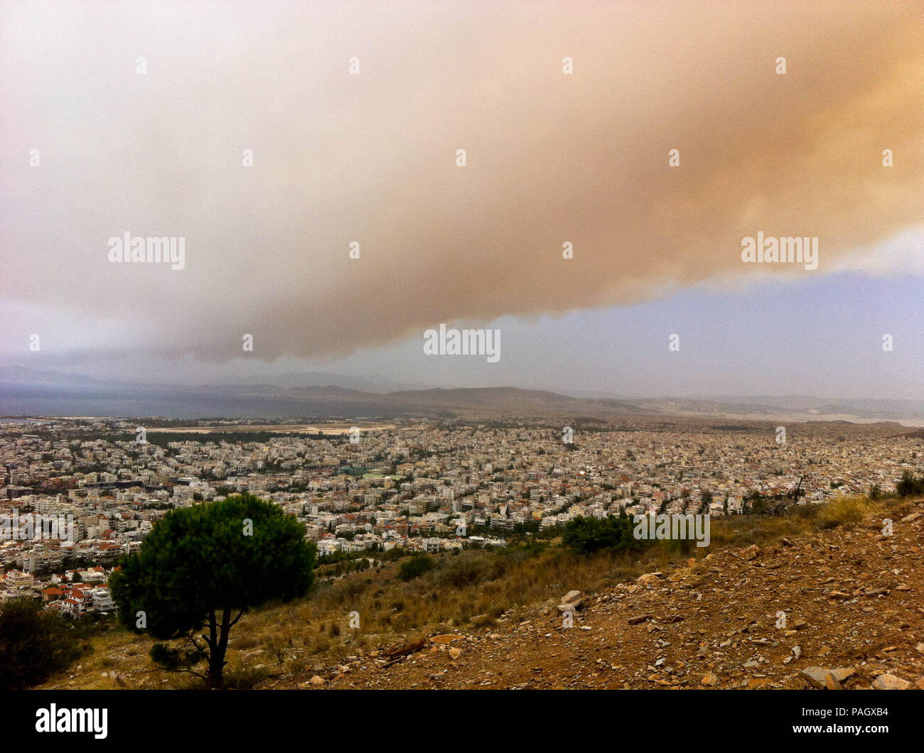 Athens, Greece. 23rd July, 2018. A pall of smoke turns large parts of ...