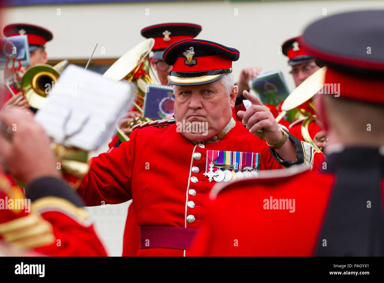 The leader / conductor, conducting the Regimental Band of the Royal ...