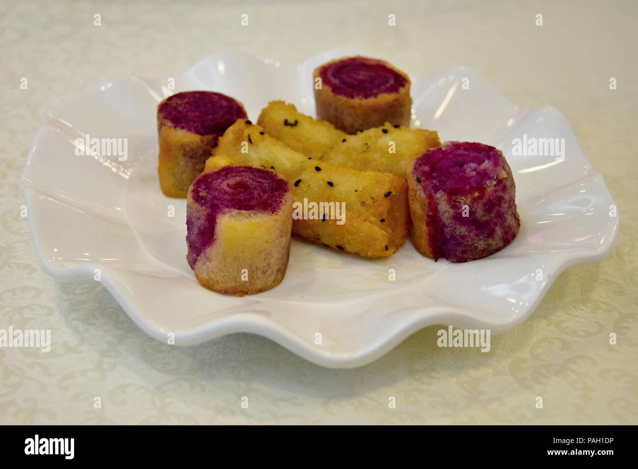 Dim sum is a style of Chinese cuisine, particularly Cantonese, prepared ...