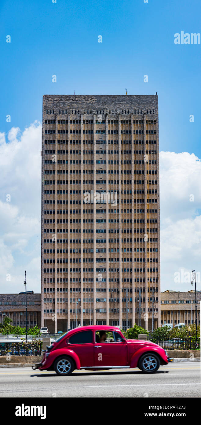 Volkswagen in front of a Tall Building in Cuba Stock Photo - Alamy