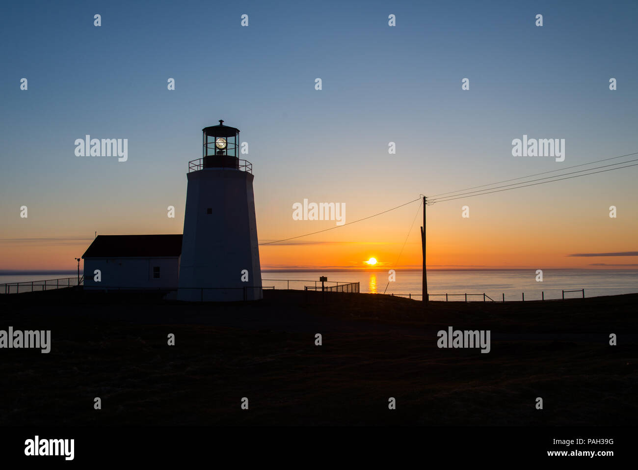 Newfoundland coastal sunset Stock Photo - Alamy