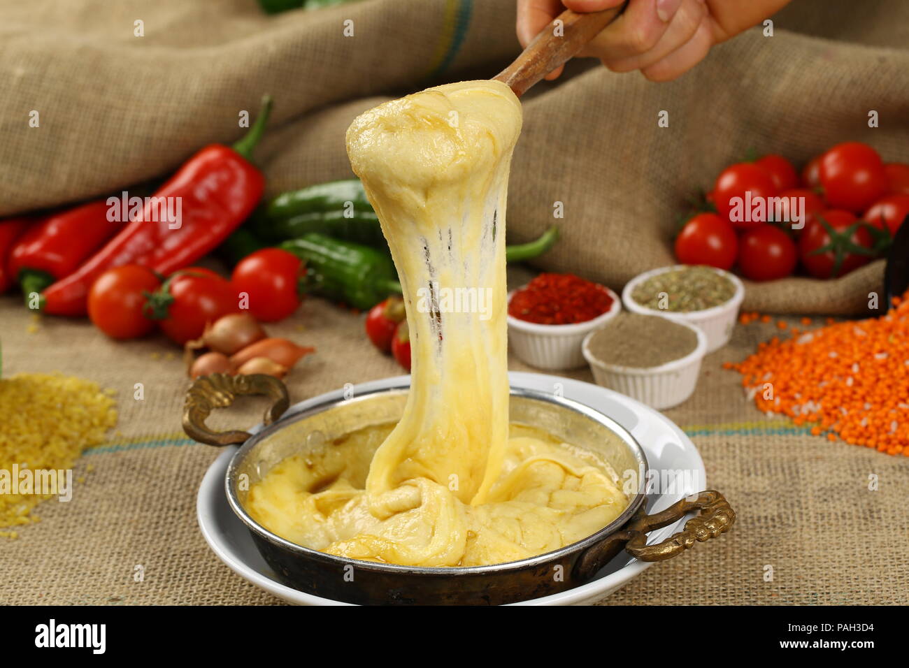 Melted cheese and corn flour Stock Photo - Alamy
