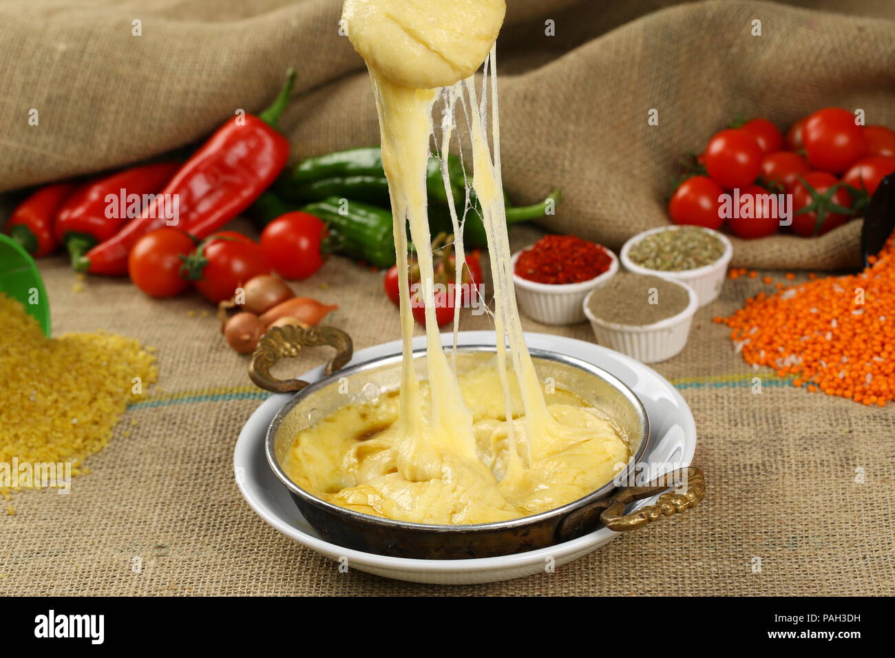 Melted cheese and corn flour Stock Photo - Alamy