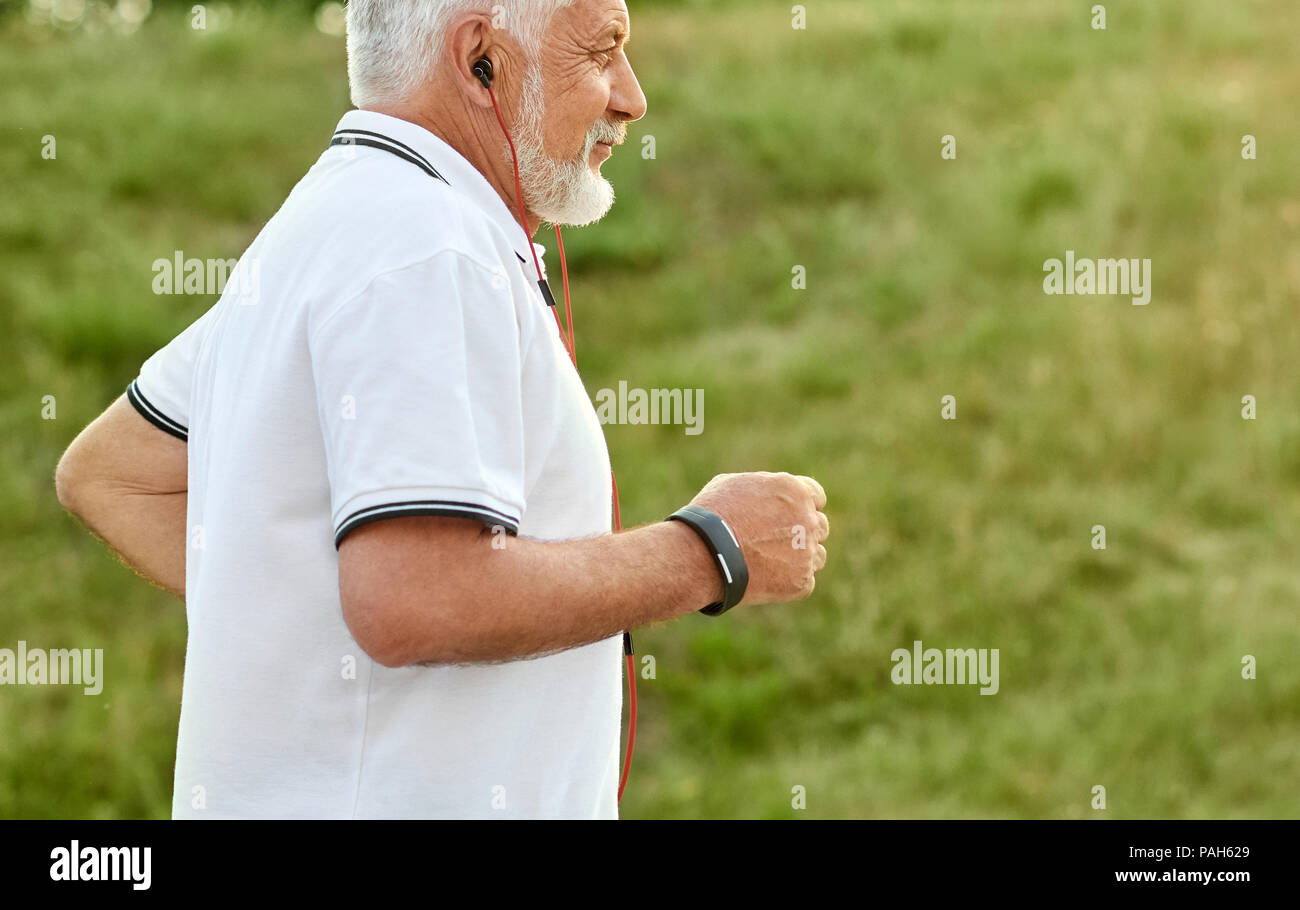 Old man running young hi-res stock photography and images - Alamy