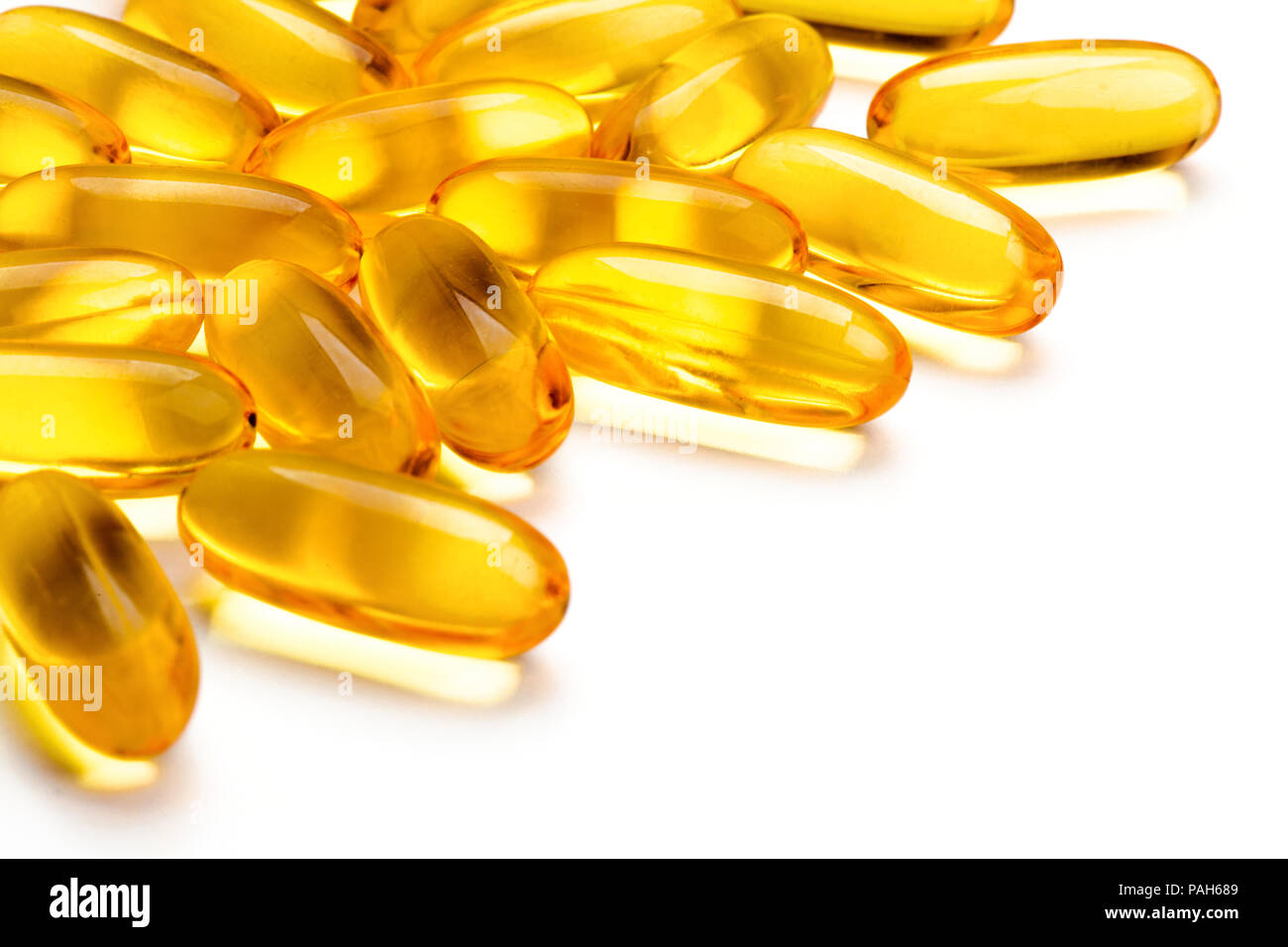 Pile of capsules Omega 3 on white background Stock Photo - Alamy