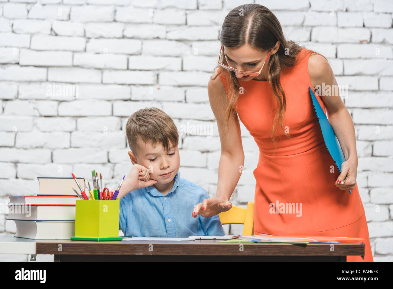 Woman teacher boy student hi-res stock photography and images - Alamy