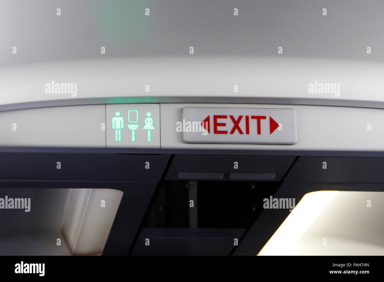 Airplane toilet sign hi-res stock photography and images - Alamy