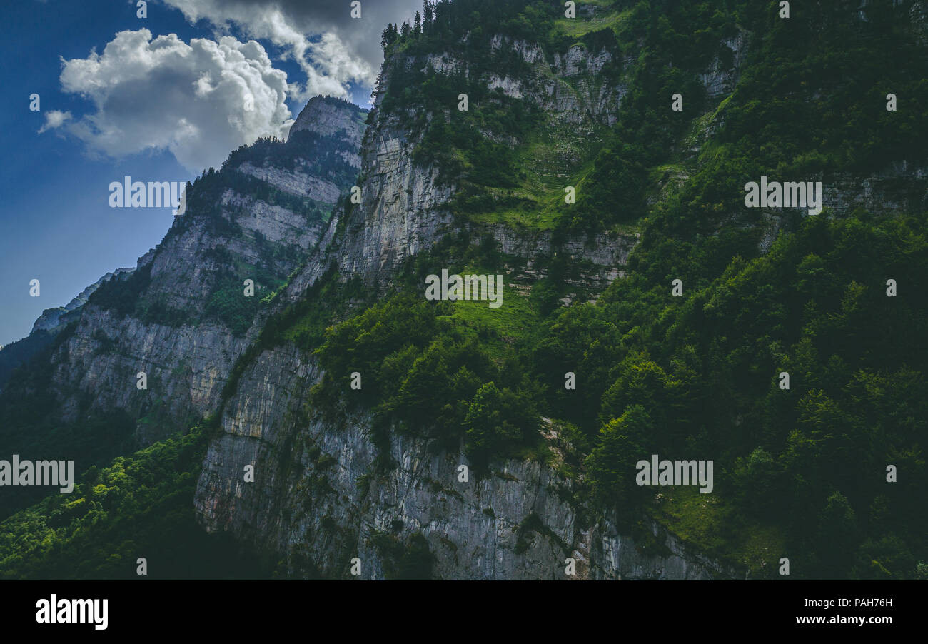 aerial view of steep mountain cliff in the swiss alps Stock Photo - Alamy