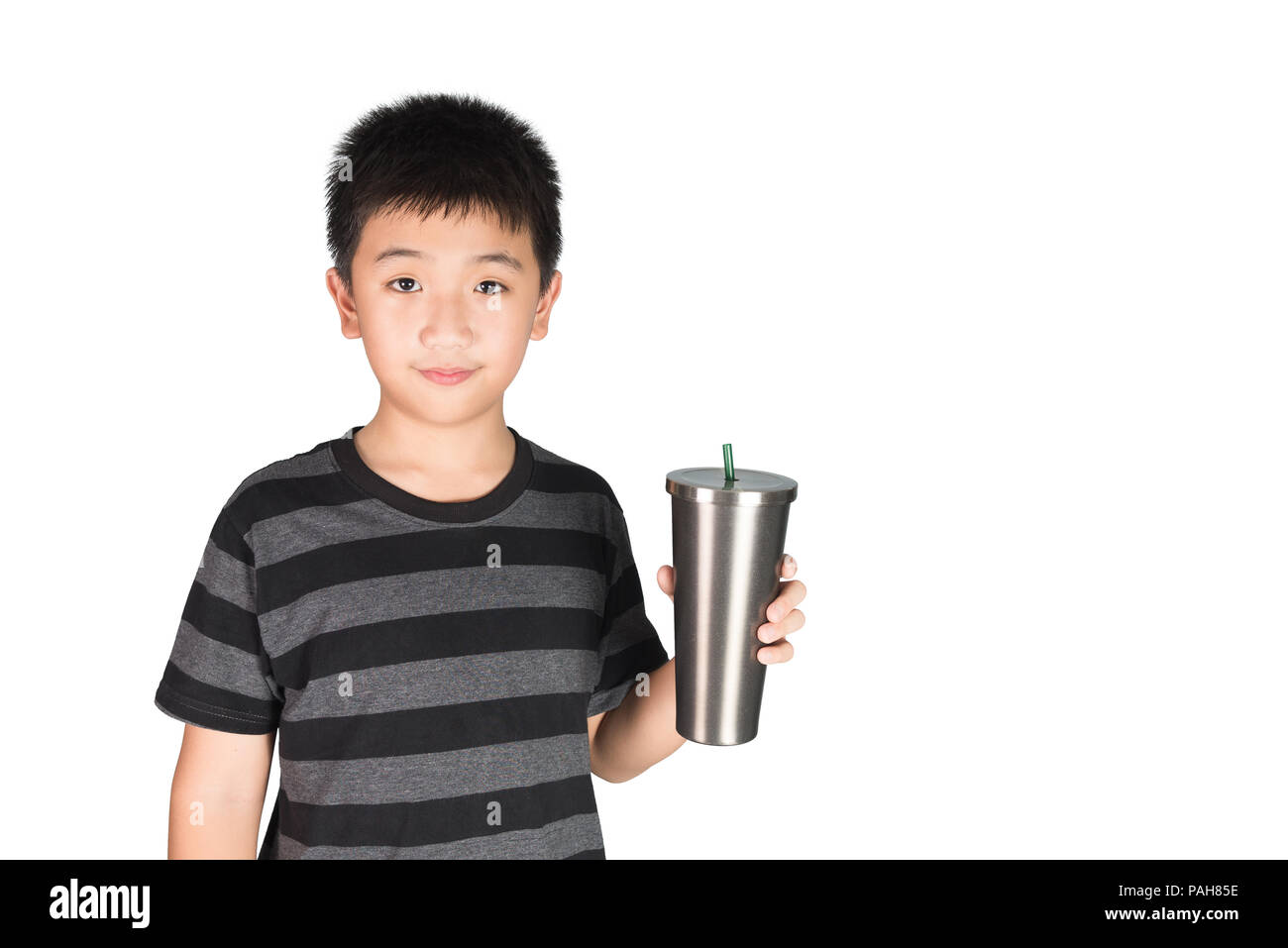 Asian kid boy holding stainless steel tumbler cup with straw, isolated ...