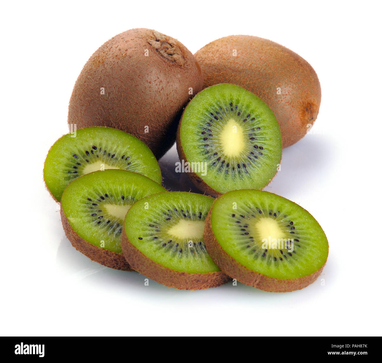 ripe kiwi and segment on a white background Stock Photo - Alamy