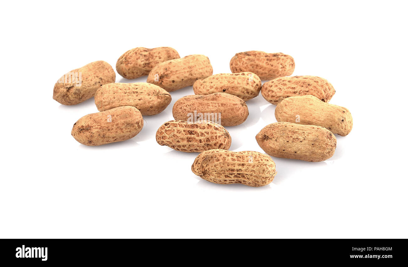 Peanuts, nuts in shells on white background Stock Photo - Alamy
