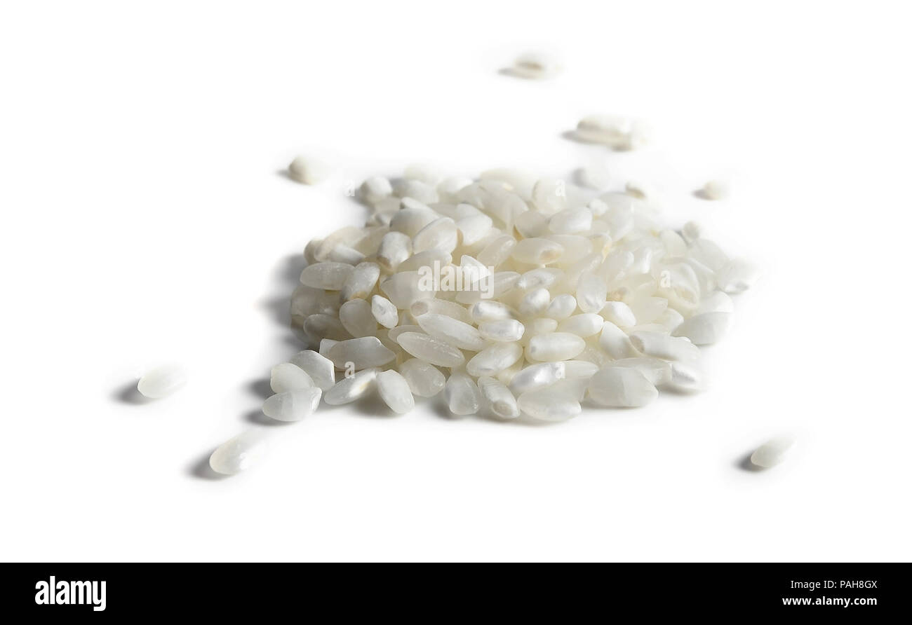 Uncooked Japanese milled rice isolated on white background Stock Photo ...