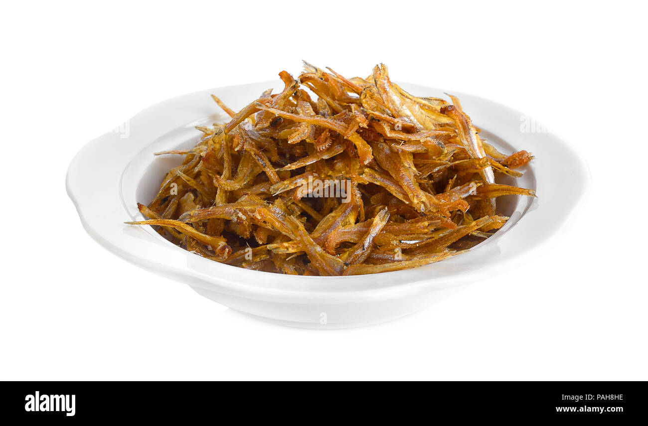 small fried fish on white background Stock Photo - Alamy