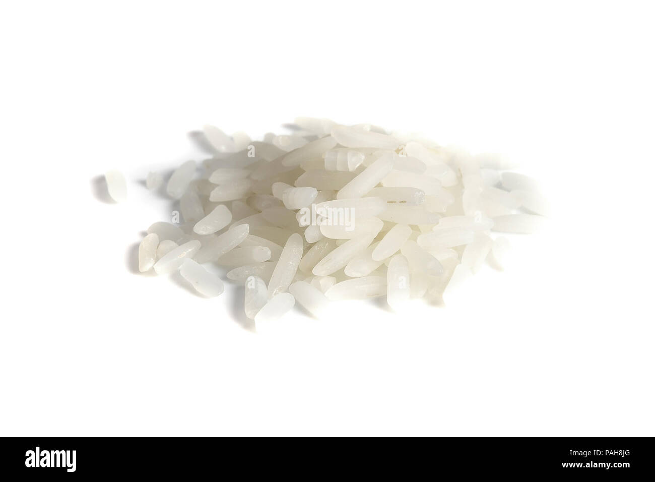milled rice on white background Stock Photo - Alamy