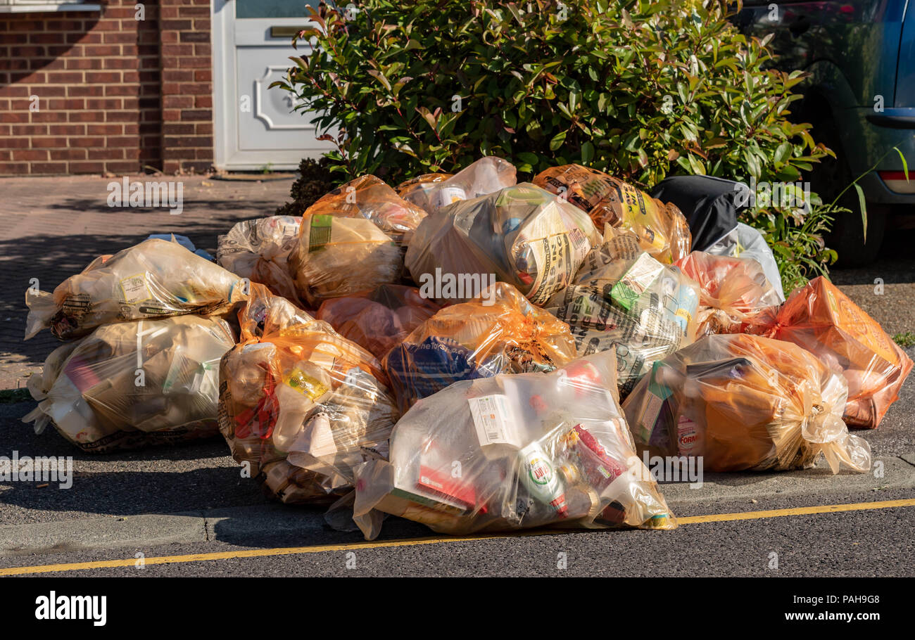 Recycling plastic waste sacks in a pile awaiting collection Stock Photo ...