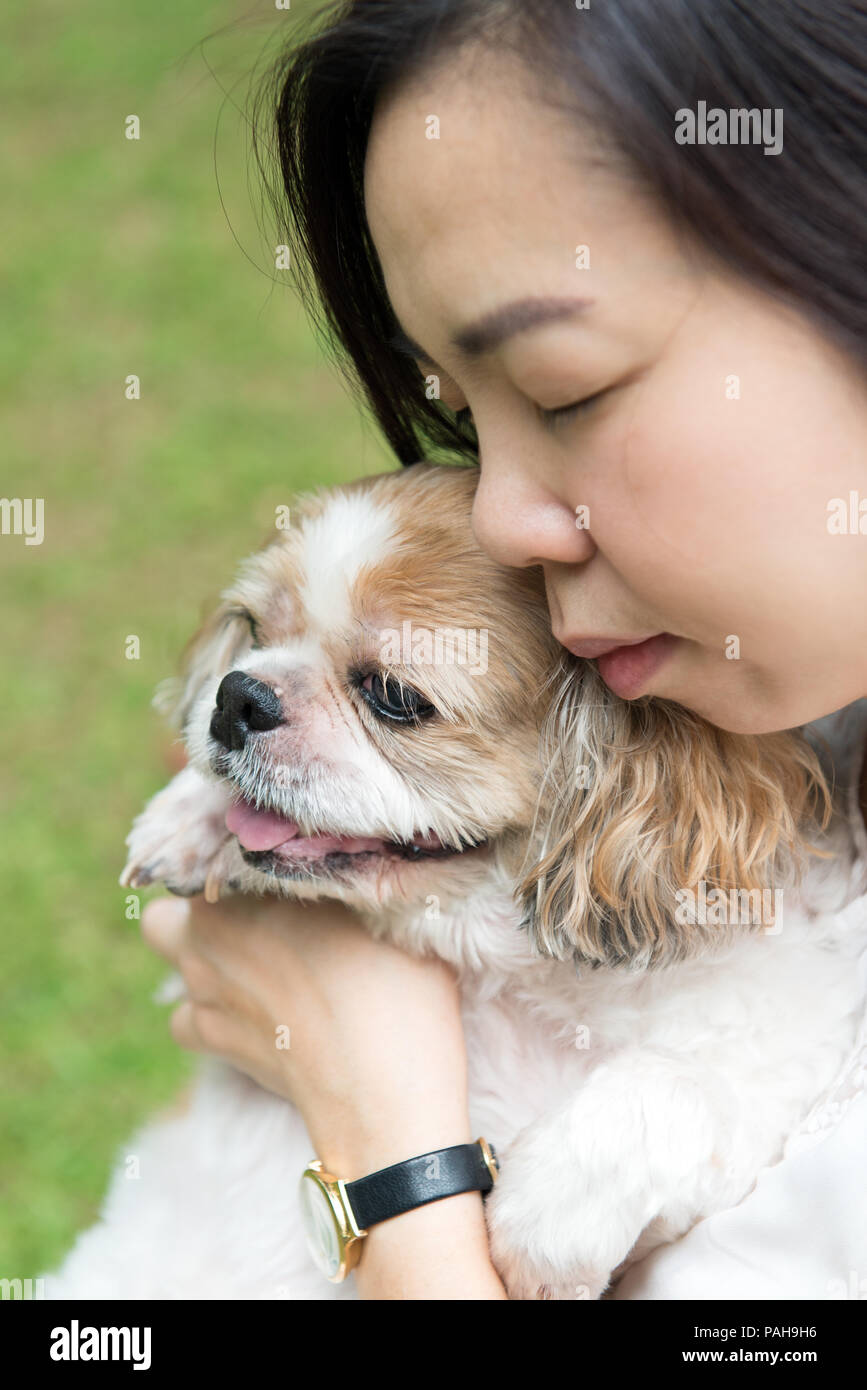 Young lady with pet dog hi-res stock photography and images - Alamy