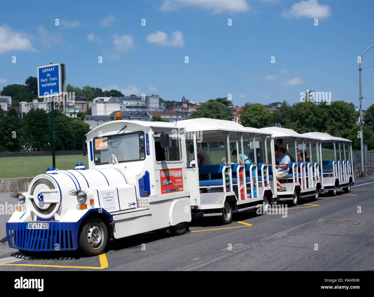 A tourist train in Lourdes, Hautes Pyrenees, France Stock Photo - Alamy