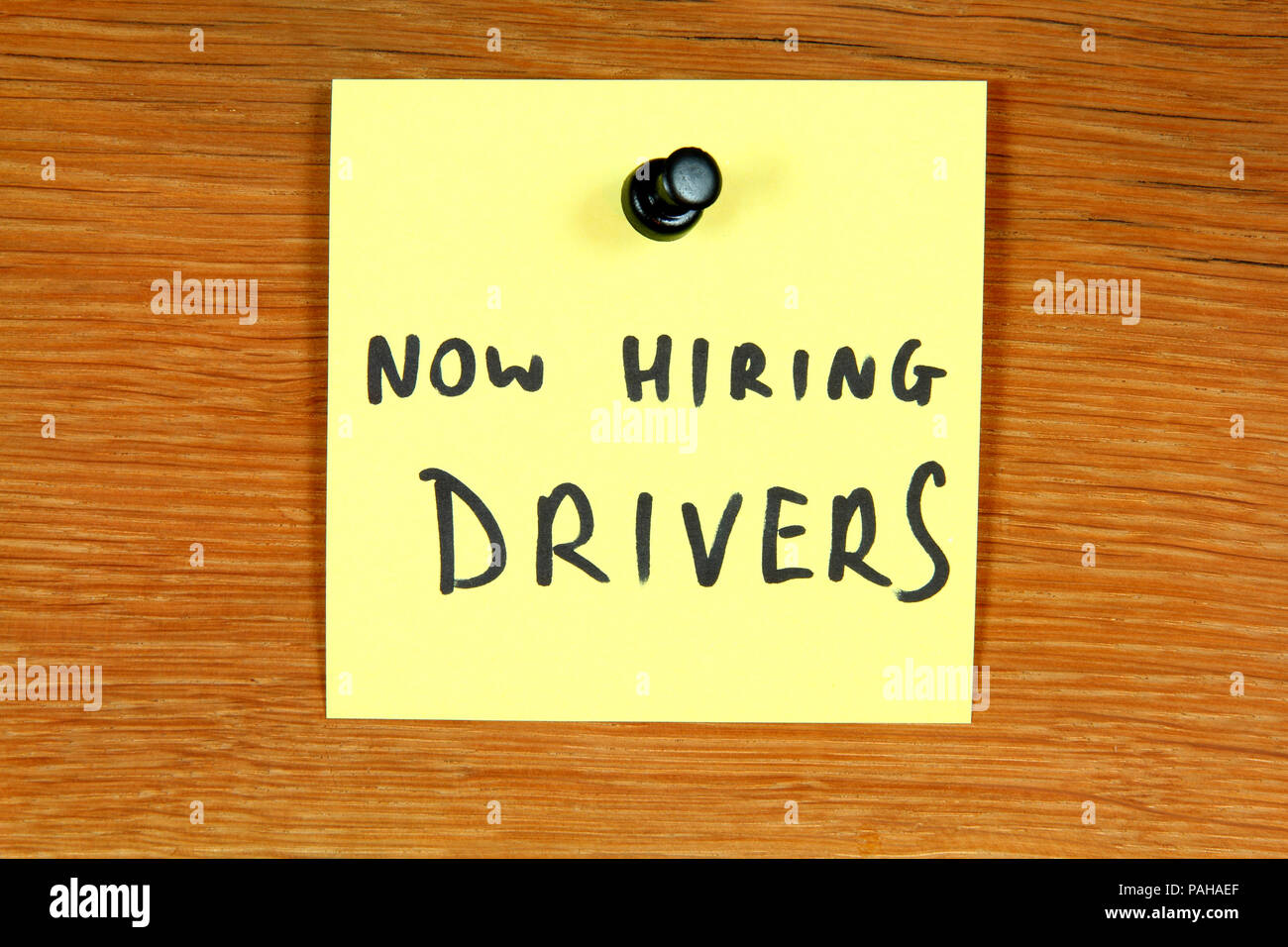 Sticky note with employment message - hiring drivers. Unemployment ...