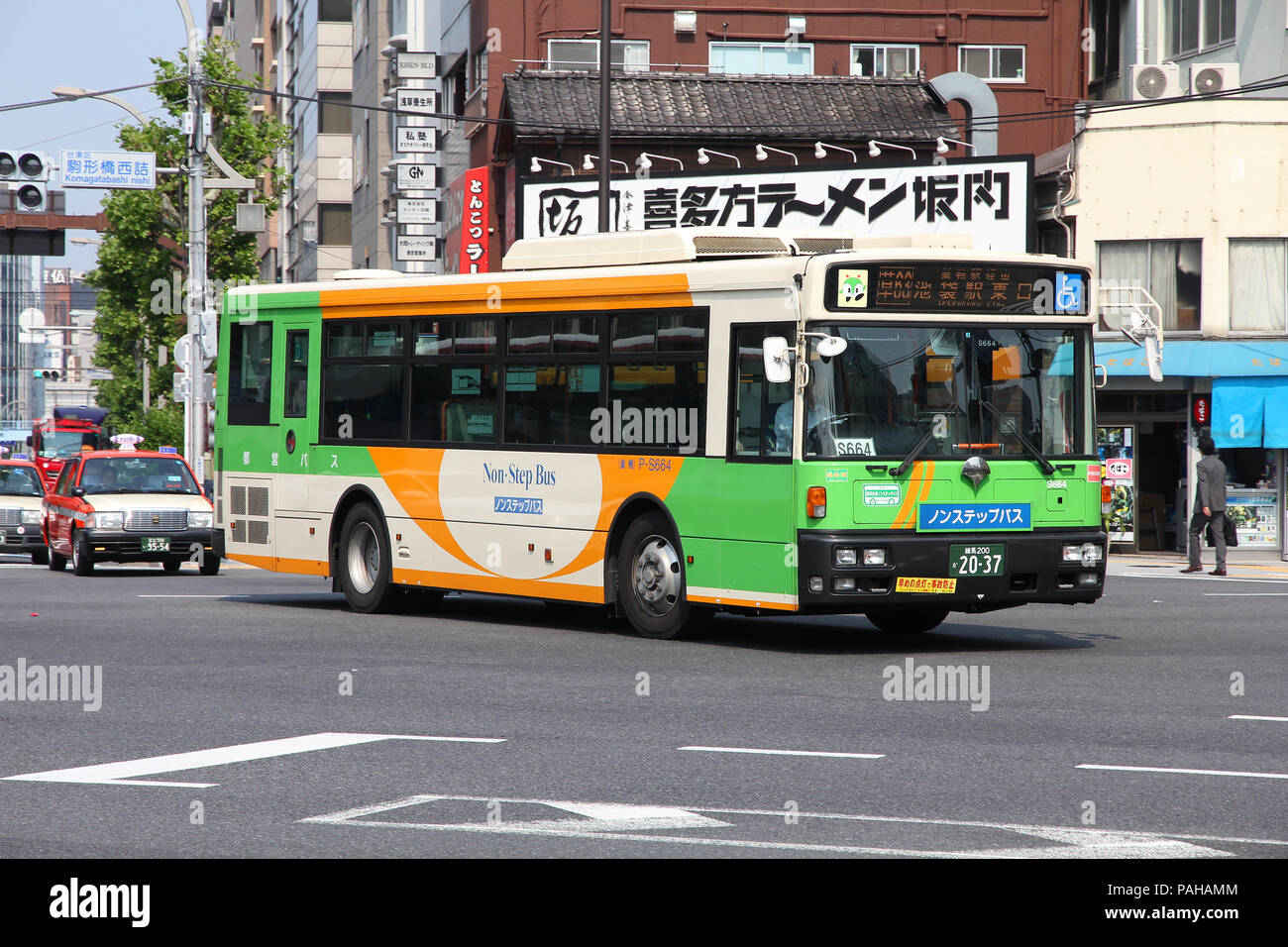 TOKYO - MAY 10: Commuters ride Toei Bus on May 10, 2012 in Tokyo. Toei ...