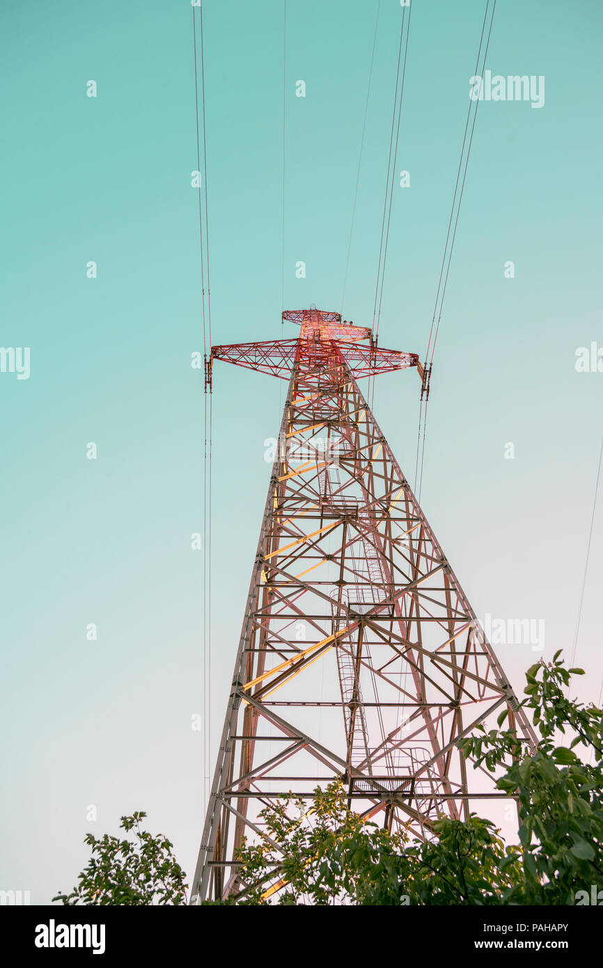 Overhead power transmission line tower with strange concrete foundation ...