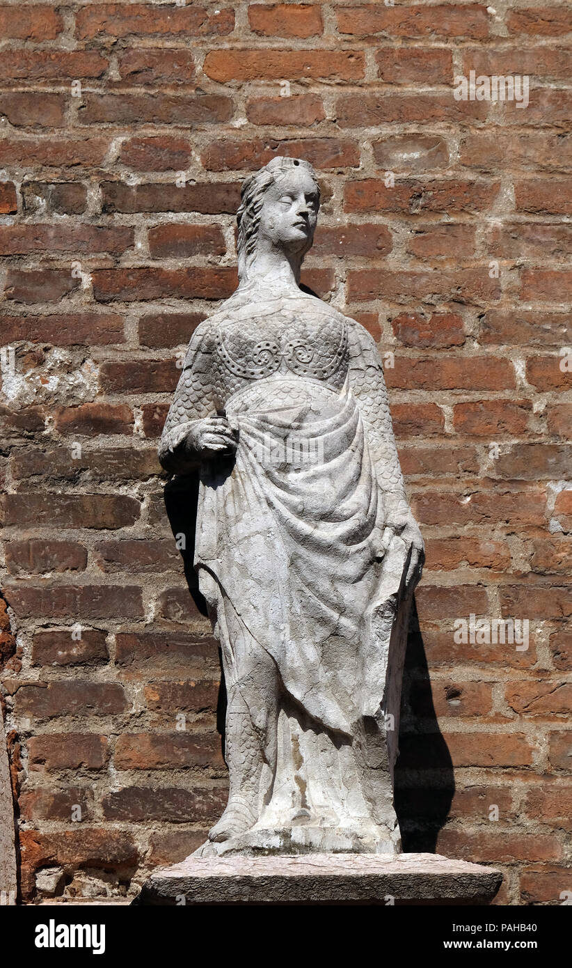 Female statue on the portal of Saint Eufemia Gothic-style, Roman ...
