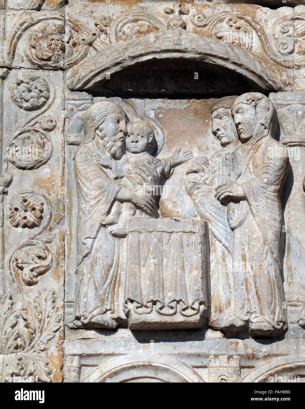 Presentation of Jesus in the Temple, medieval relief on the facade of ...