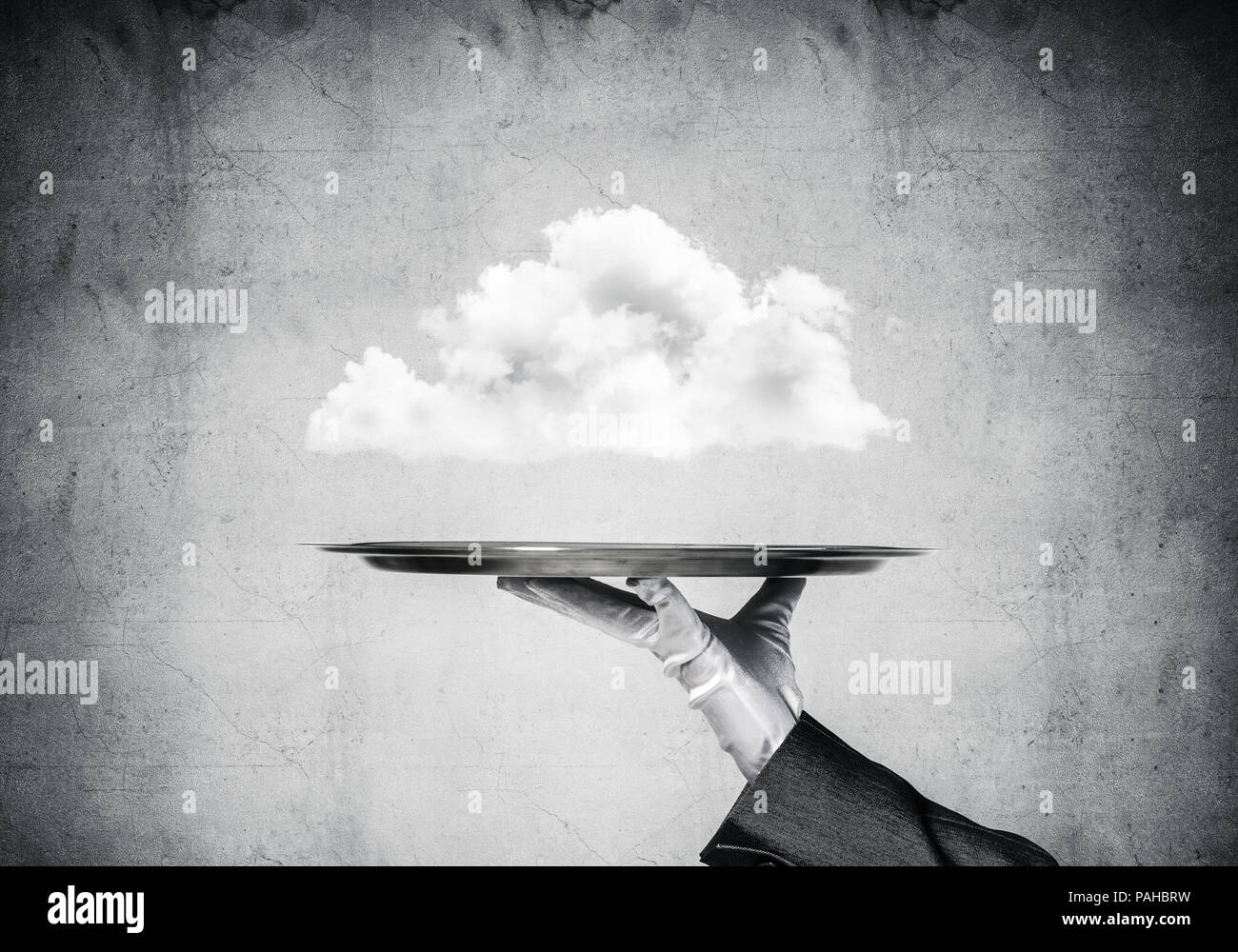 Hand of waitress presenting cloud on tray Stock Photo - Alamy