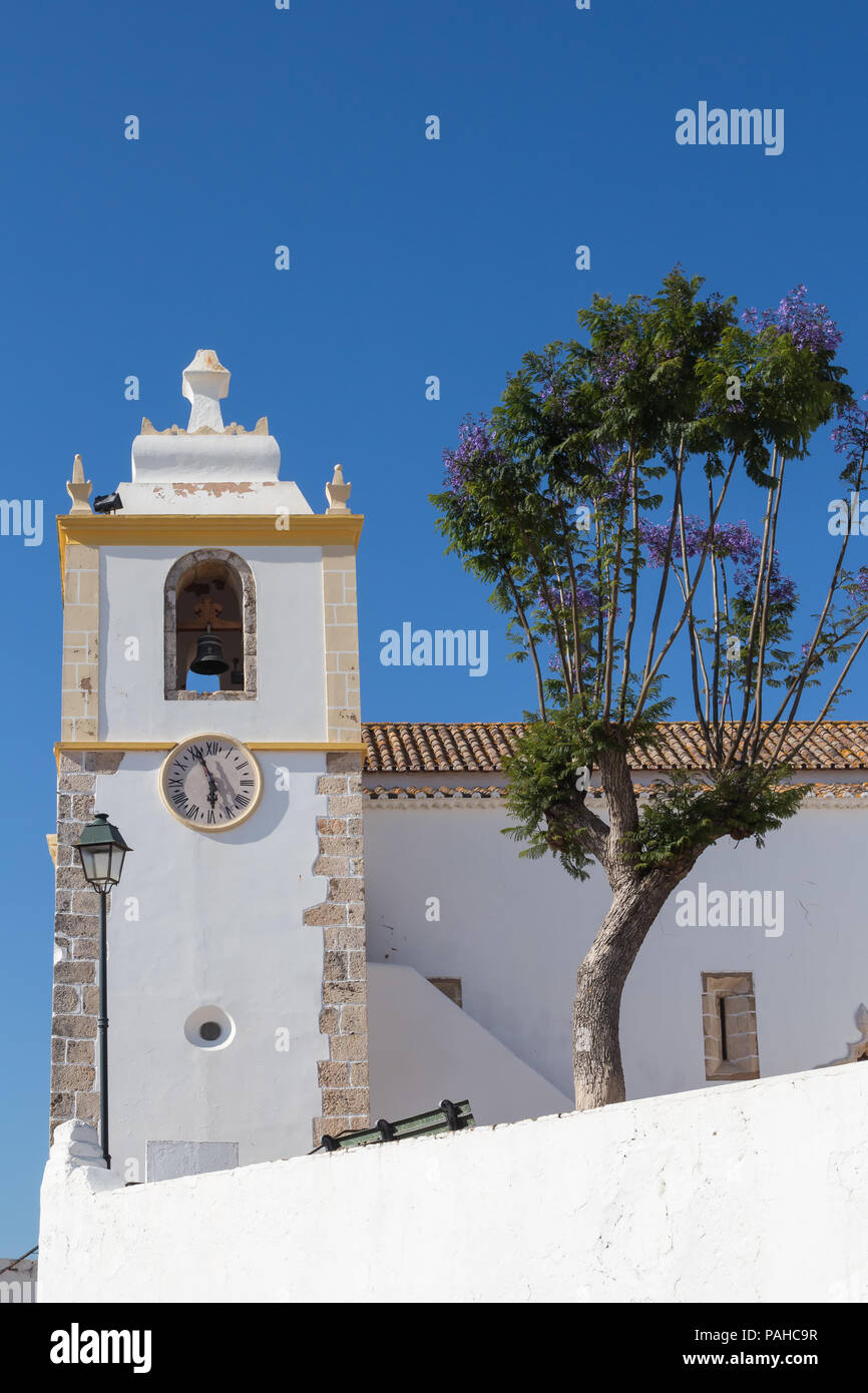 Tower of Igreja Matriz de Alvor - church in a portuguese city. White ...